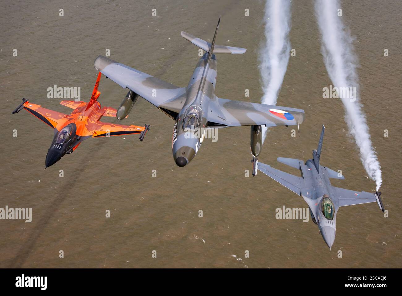 A formation of the Royal Netherlands Air Force F-16 Fighting Falcons ...