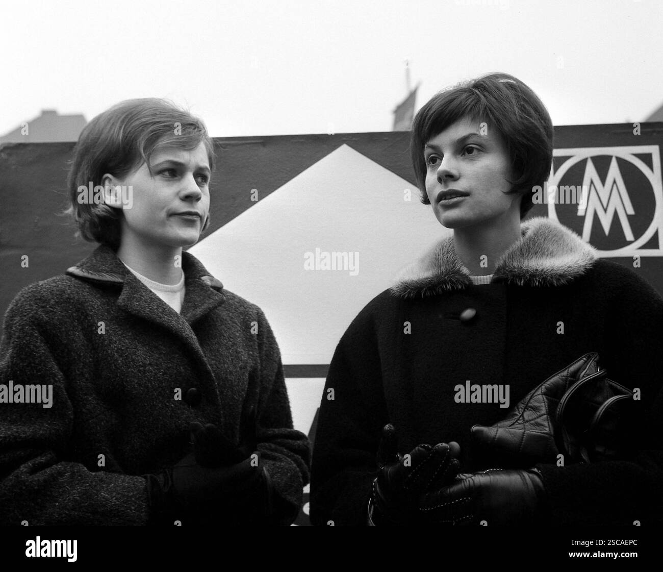 Woman sign in front Black and White Stock Photos & Images - Alamy