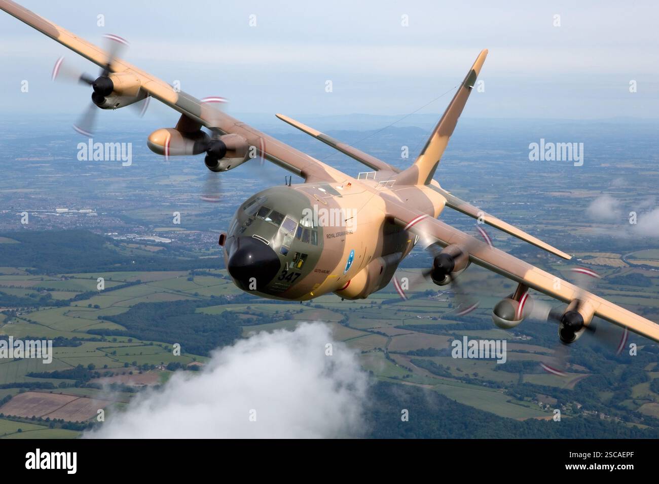 Royal Jordanian Air Force Lockheed C-130 Hercules in flight, showing ...