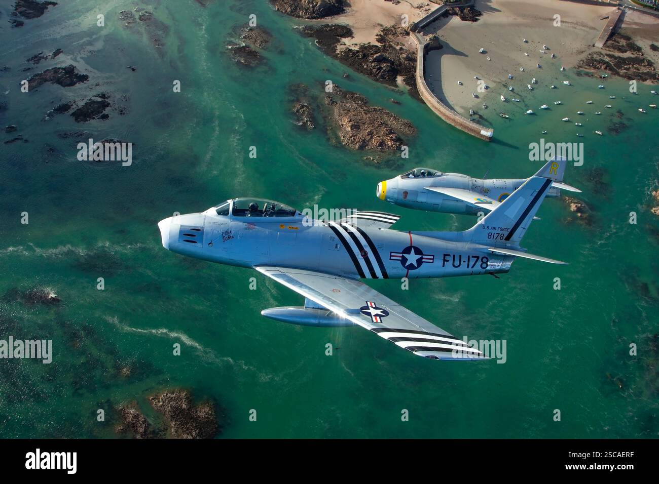 A 2-ship formation of an F-86 Sabre and Saab Tunnan during an air-to ...