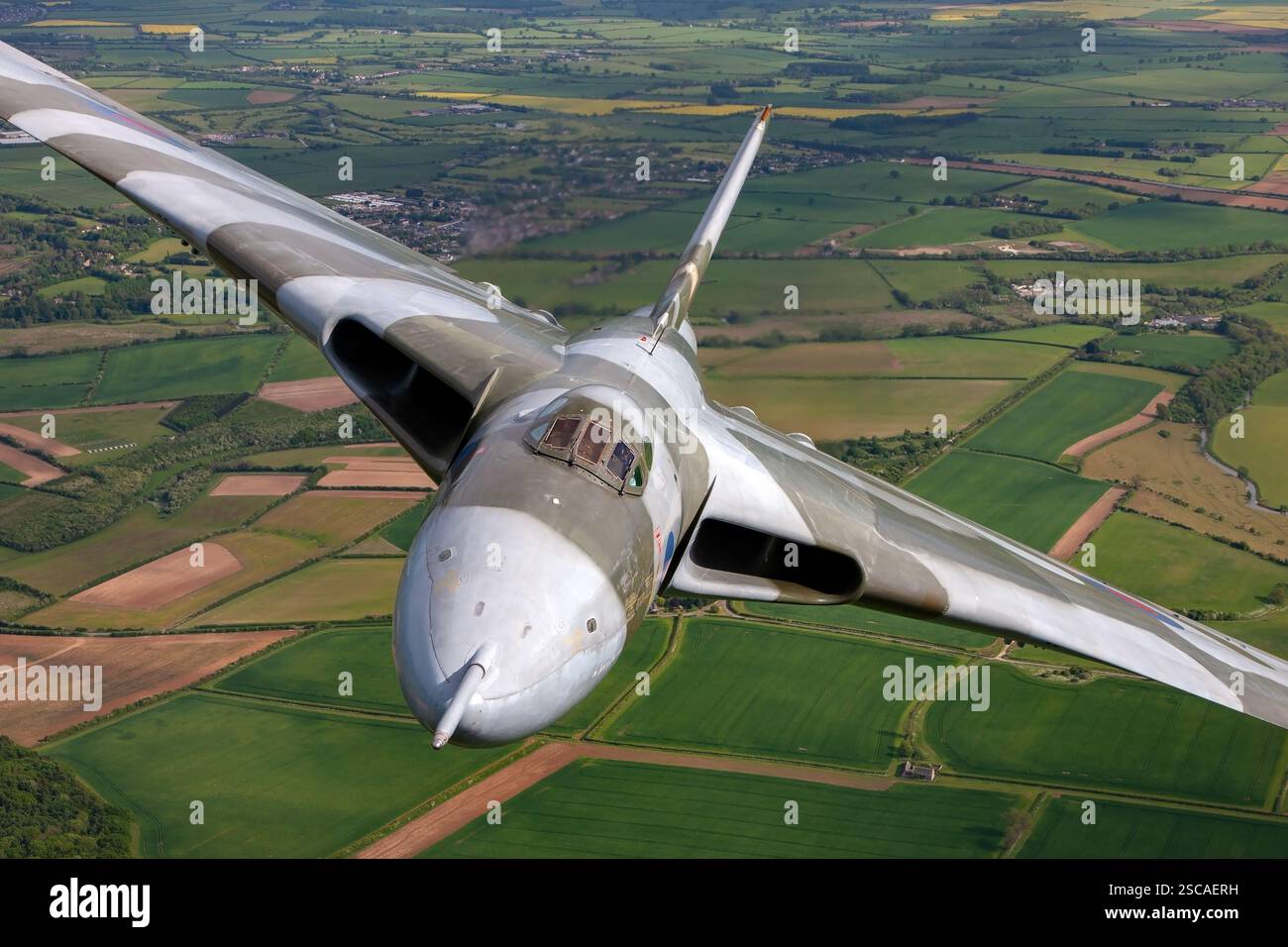 Avro Vulcan V-bomber flying at high altitude during an air-to-air photo ...