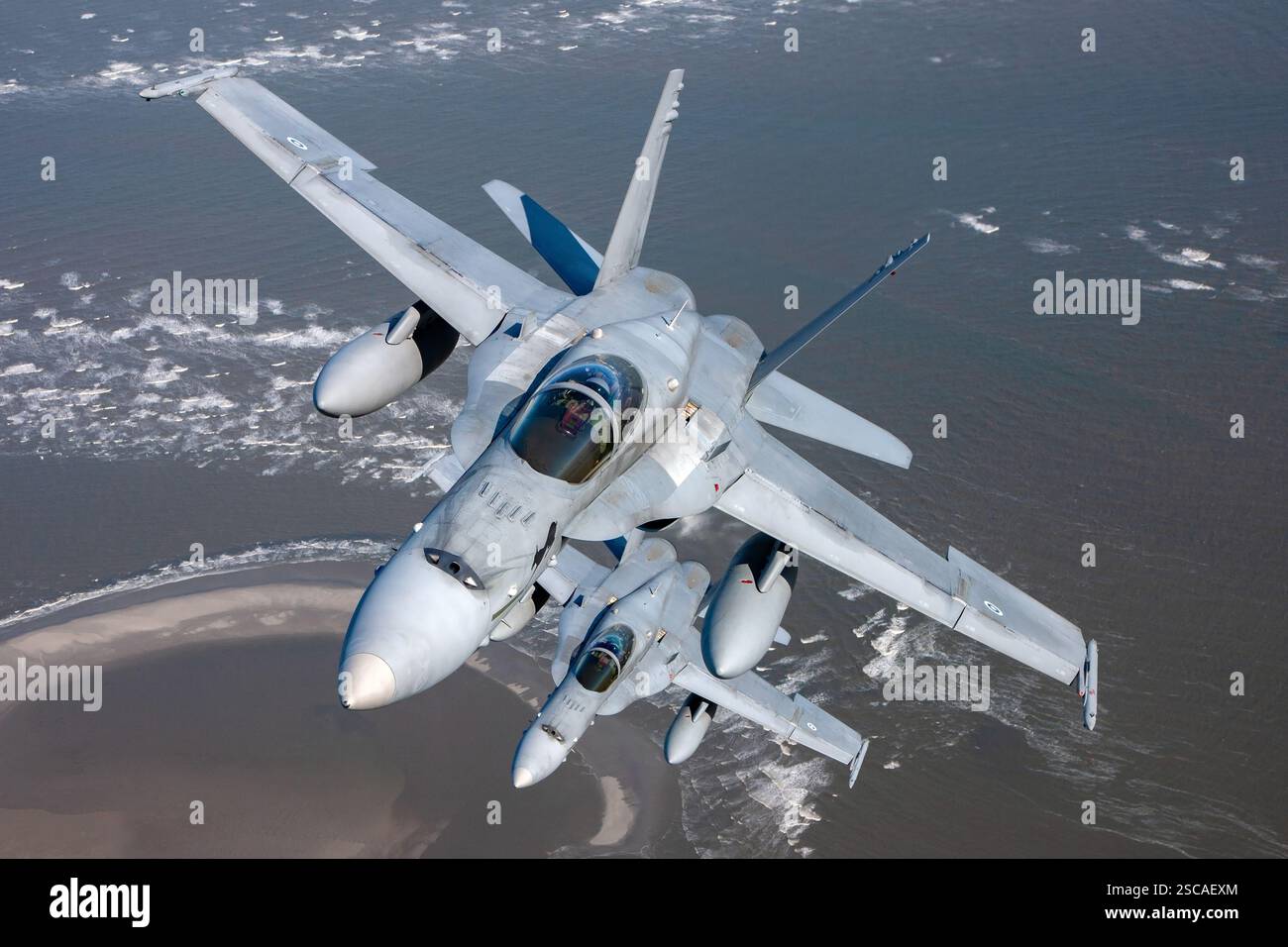 Finnish Air Force Boeing F/A-18 Hornet performing aerial maneuvers ...