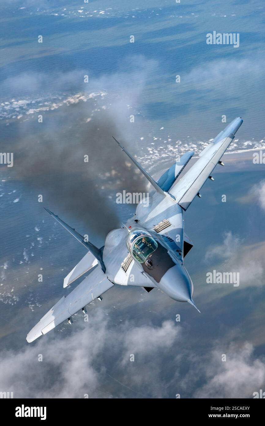 A Polish Air Force MiG-29 fighter jet in flight. This aircraft is ...