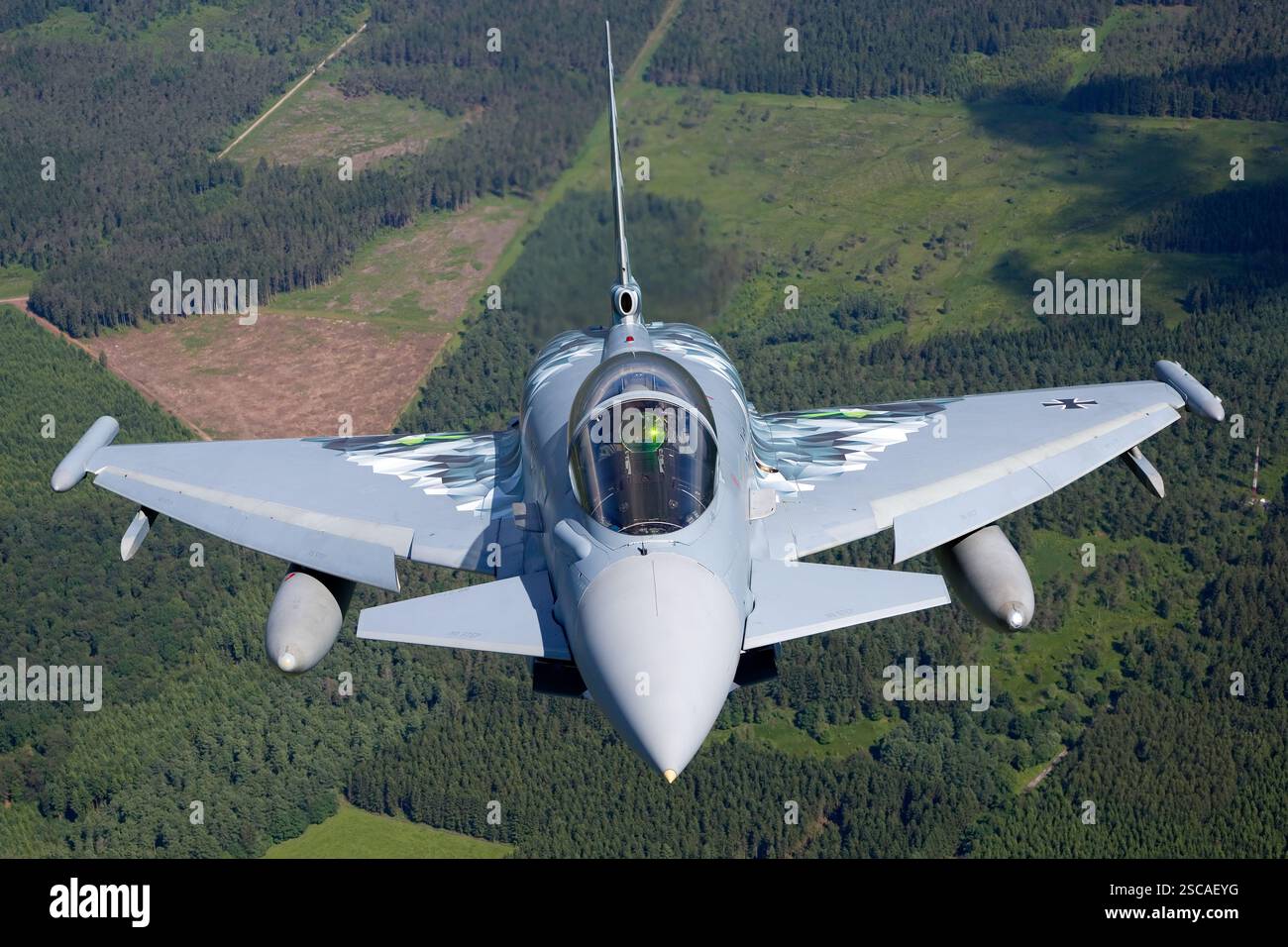 German Air Force Eurofighter Typhoon in a banked turn during an air-to-air photo shoot. The ...