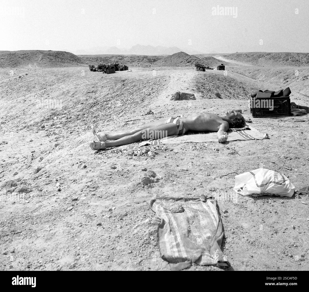 Man sunbathing at the beach of the Sinai-Peninsula, where today are ...