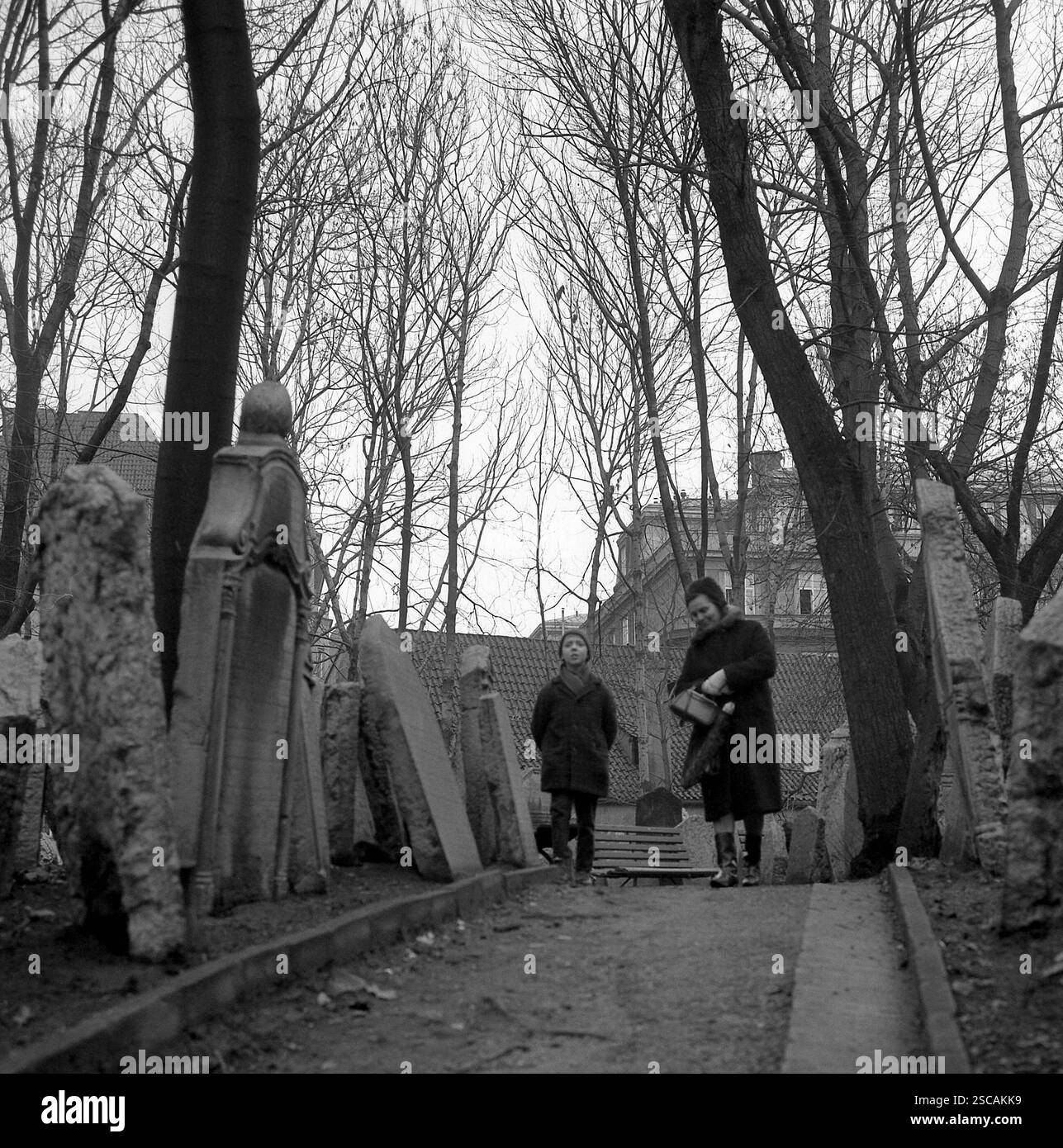 Gravestones and a mother with child at the Old Jewish Cemetery in ...