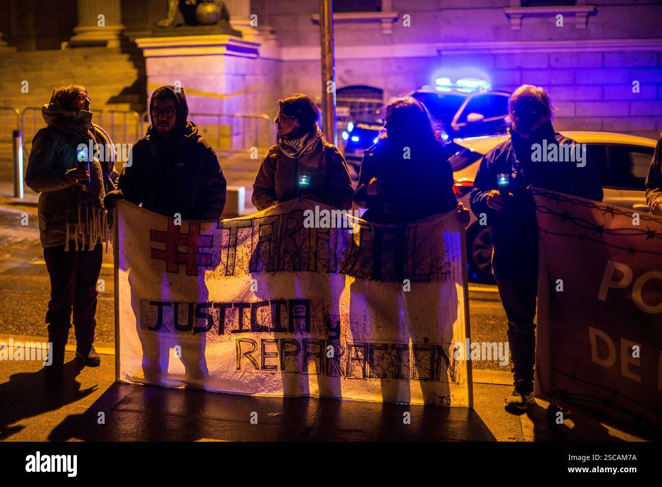 Madrid, Spain. 06th Feb, 2025. Human rights activists hold a banner ...