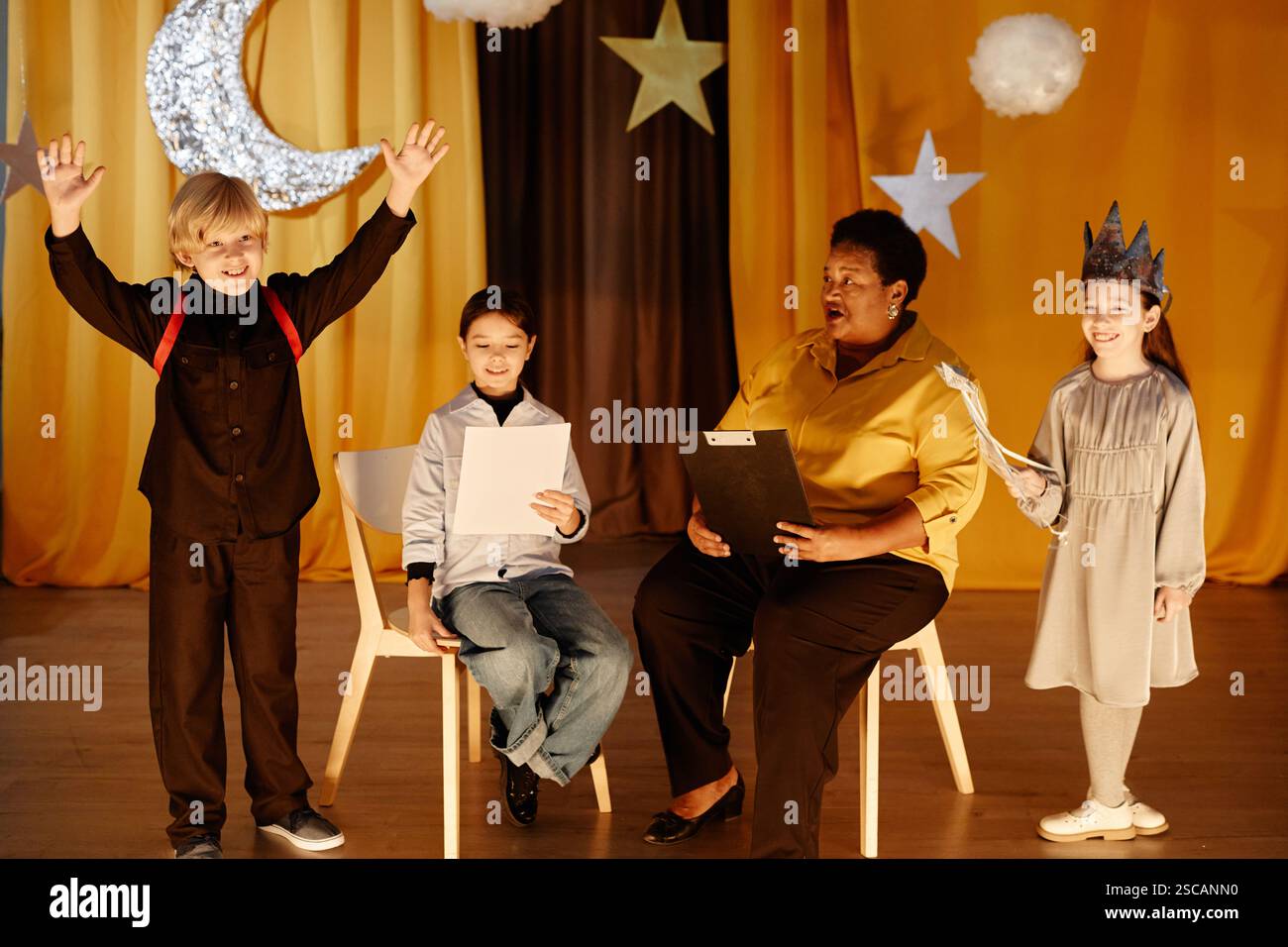 Group of children and teacher participating in educational play ...