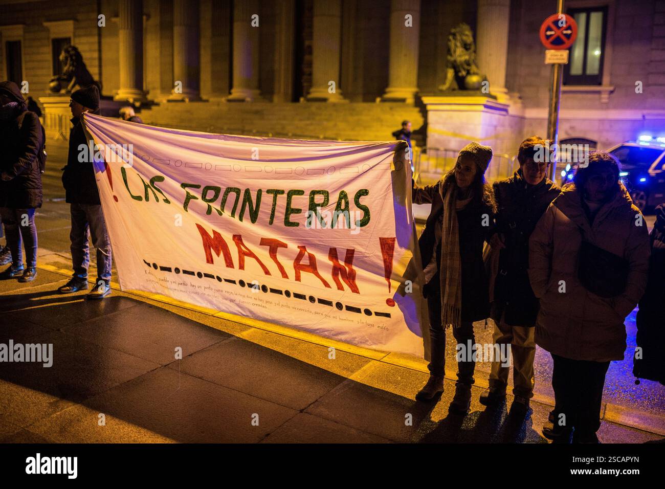 Madrid, Spain. 06th Feb, 2025. Human rights activists carry a banner ...