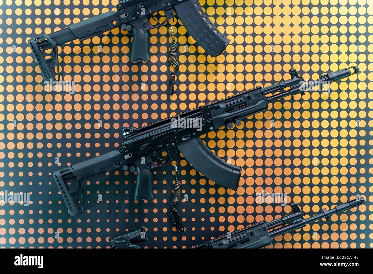 Modern weapons automatic rifles and machine gun on the counter ...