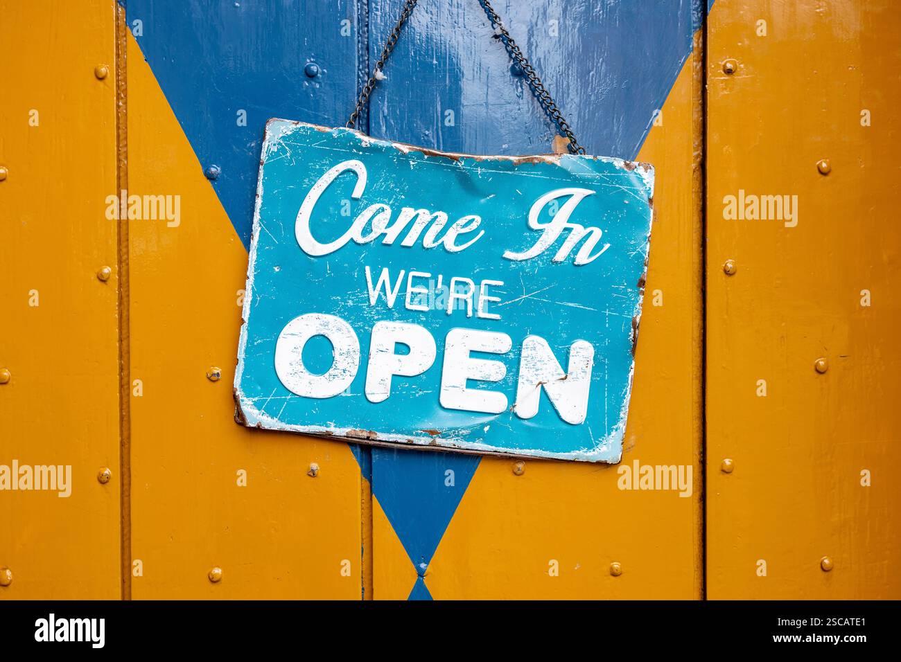 Vintage sign that says the tavern is open for drinks and public to have ...