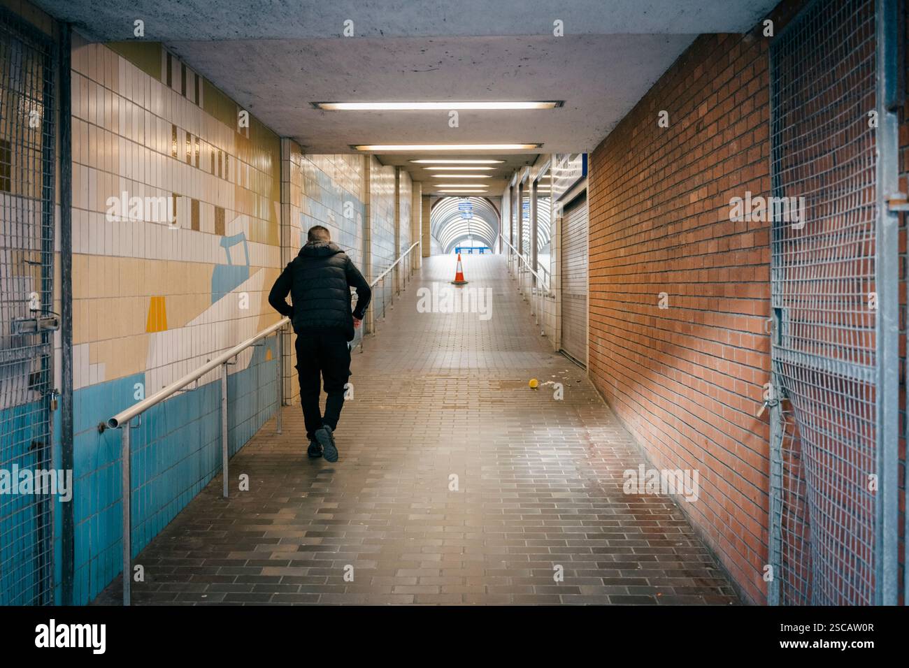 An ugly view of Torquay showing urban decay and decline, a pedestrian ...