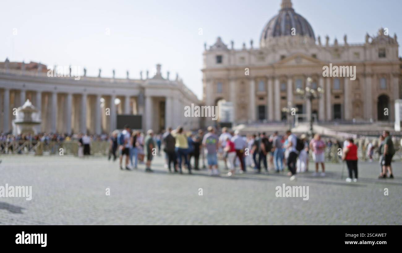 Blurred crowd standing in saint peter's basilica square with iconic ...