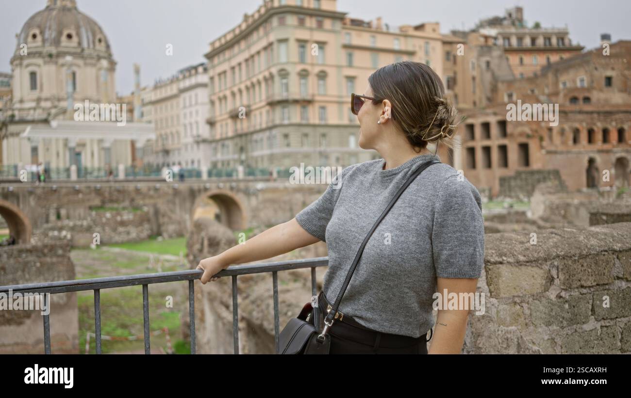 Woman admiring roman architecture in italy while standing at the ...