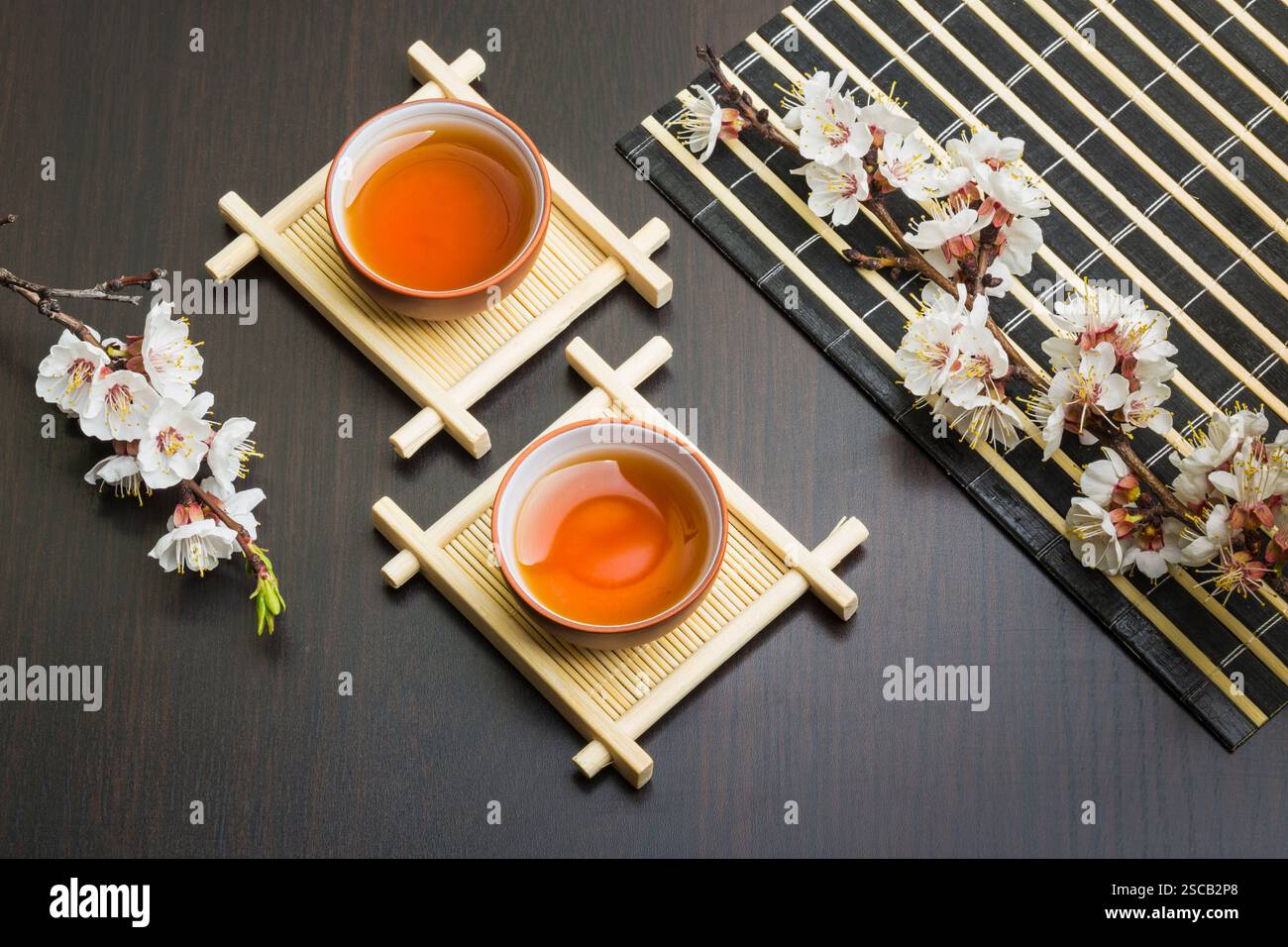 Ancient Chinese tea set with spring flowers Stock Photo - Alamy