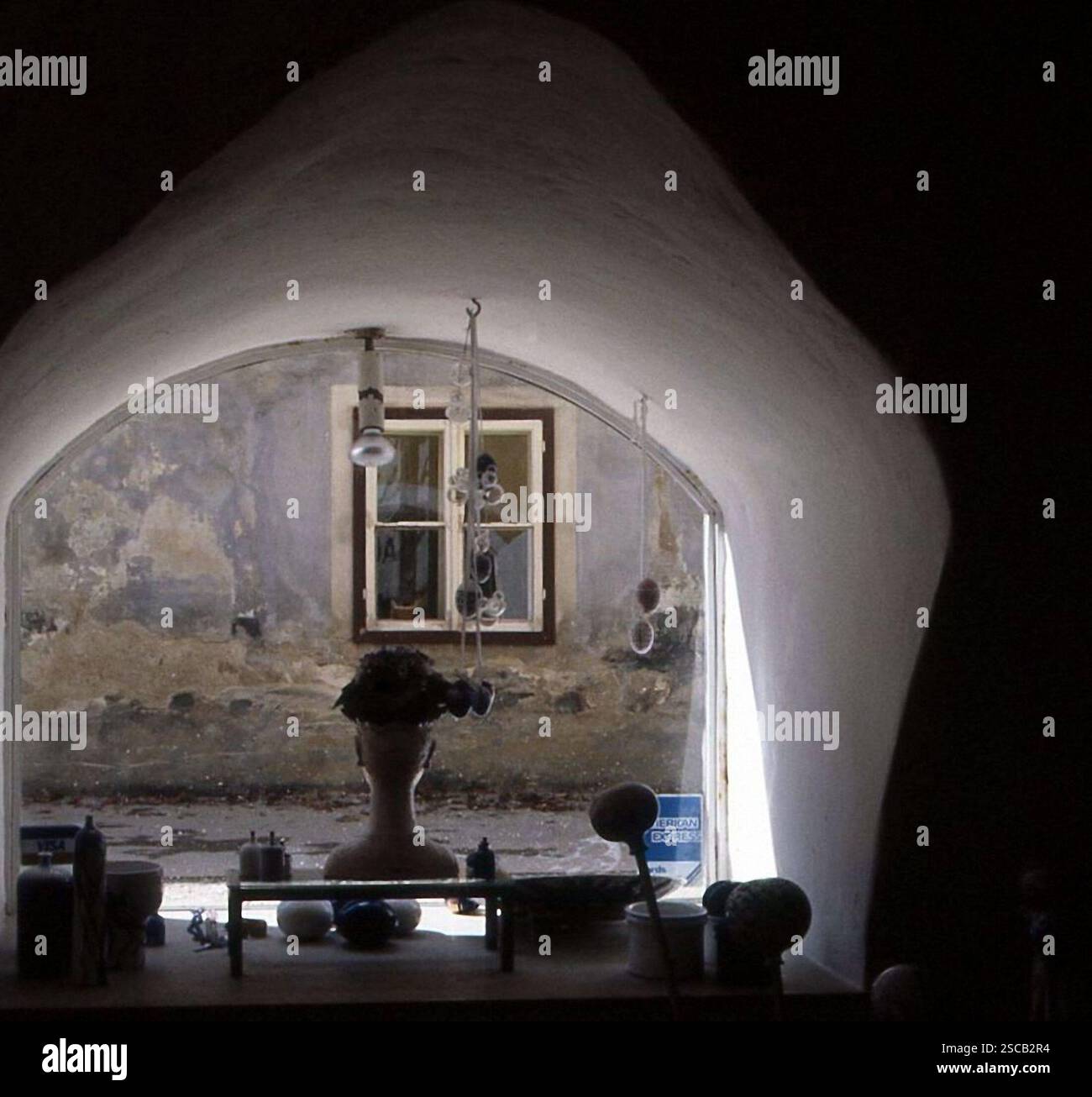 View through a shop window in another window in Hallstatt Stock Photo ...