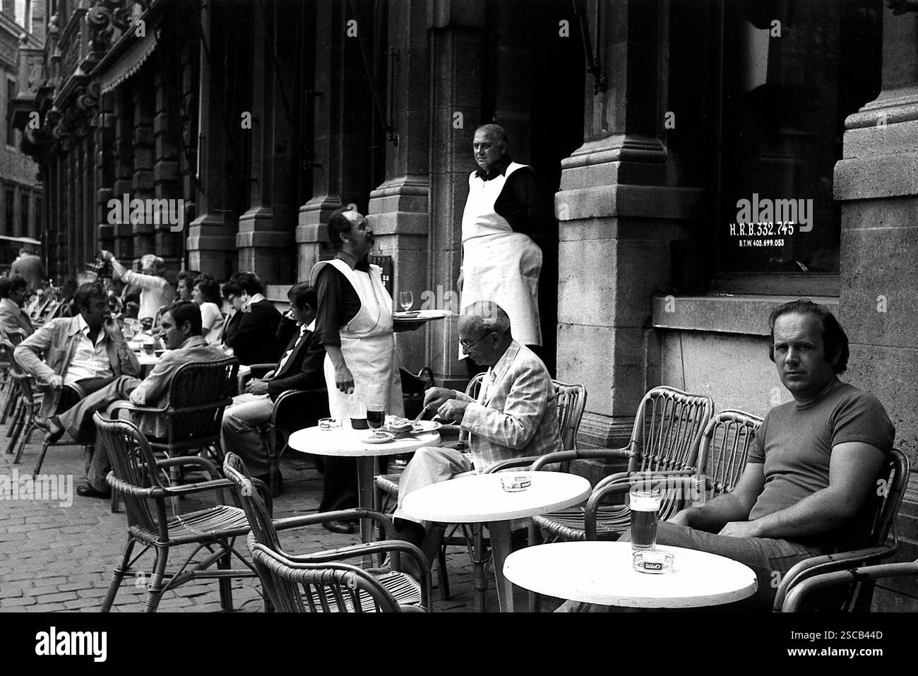 Cafe guests Black and White Stock Photos & Images - Alamy