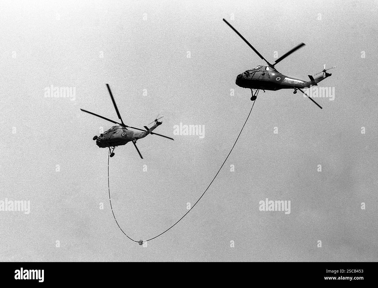 Royal navy helicopter flying Black and White Stock Photos & Images - Alamy