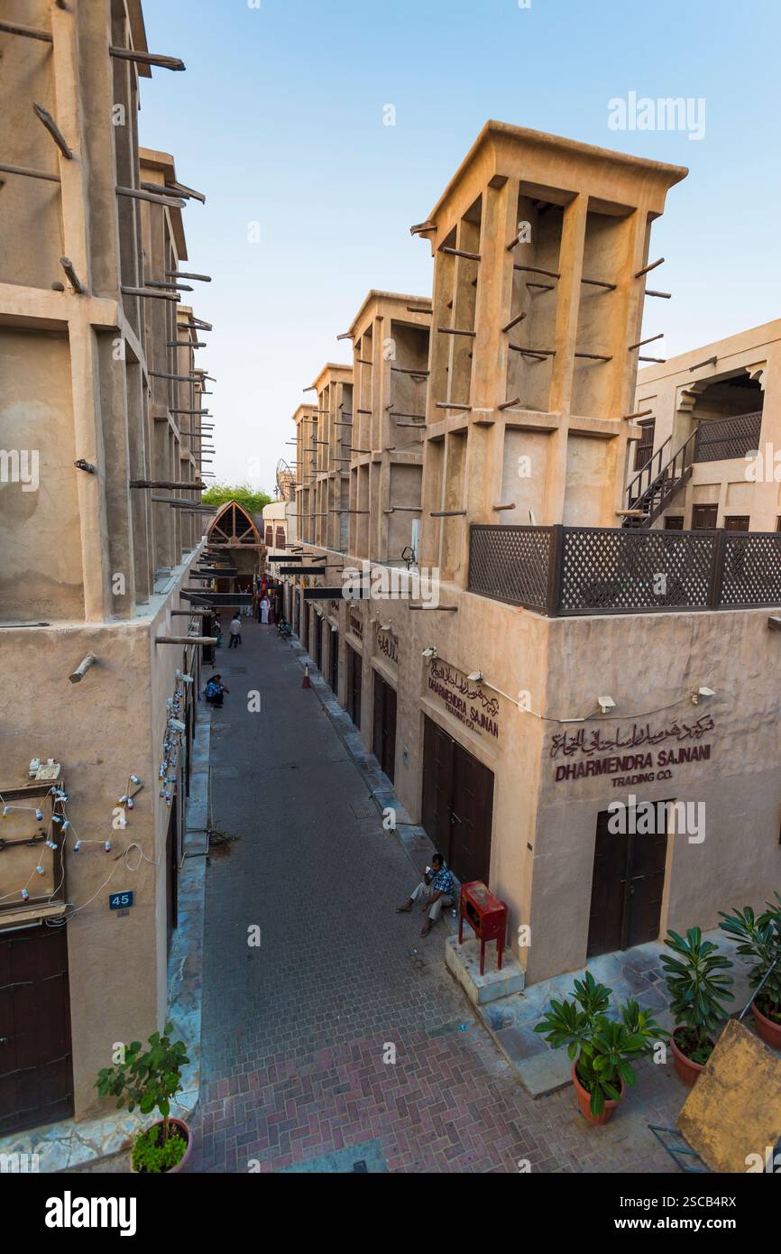 DUBAI, UAE - 8 NOVEMBER 2013: Old buildings and narrow streets in Deira ...