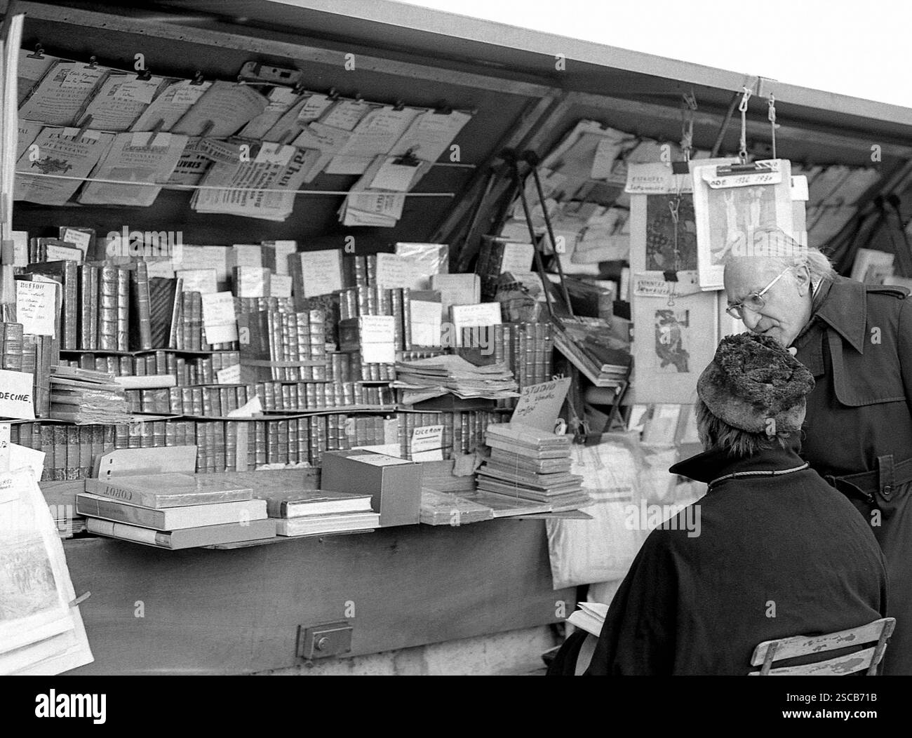 A stand of Les Bouquinistes at the Seine in Paris. These are ...