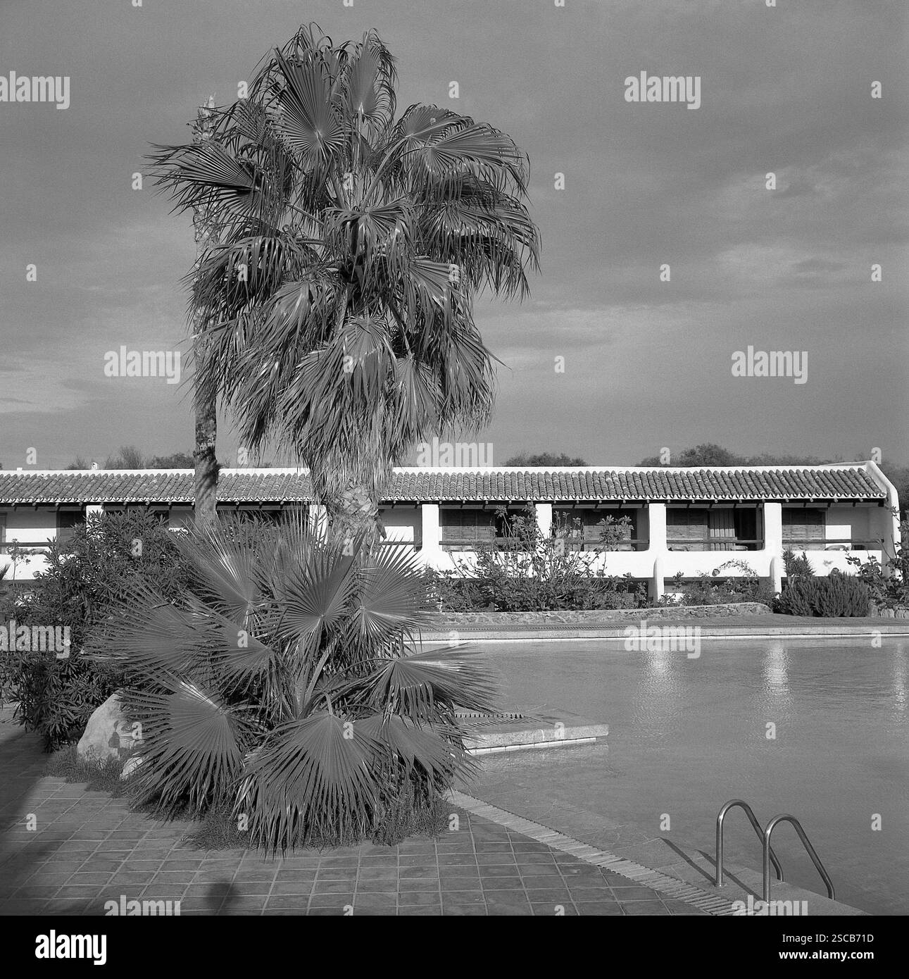 Pool in holiday resort Black and White Stock Photos & Images - Alamy