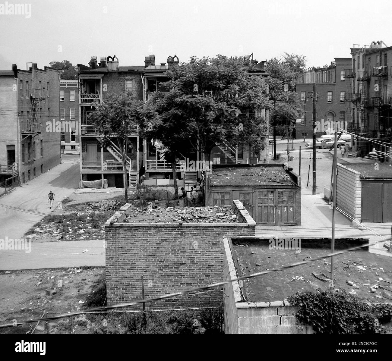Houses and children playing on the streets in Baltimore Stock Photo - Alamy