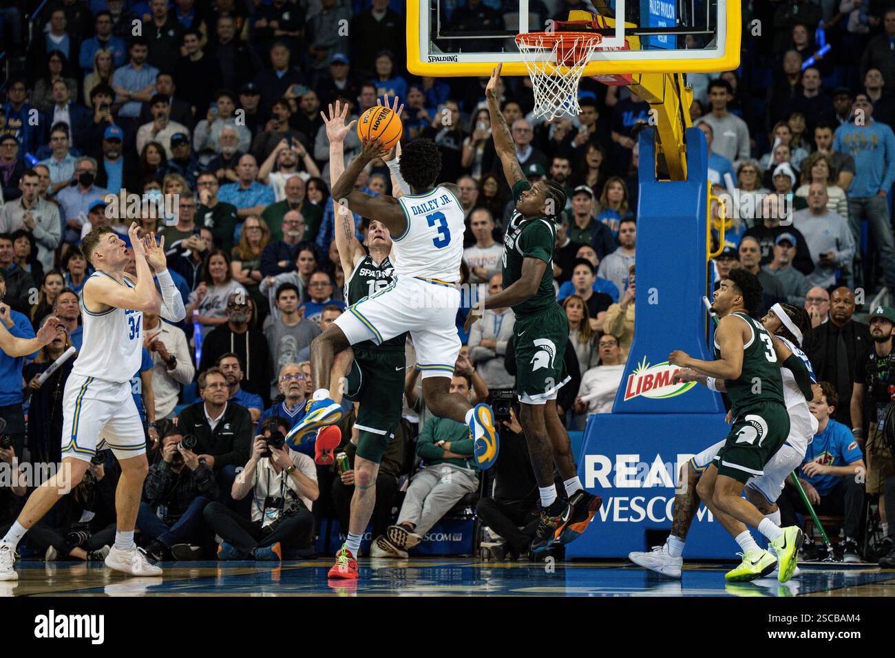 UCLA Bruins guard Eric Dailey Jr. (3) shoots over Michigan State ...
