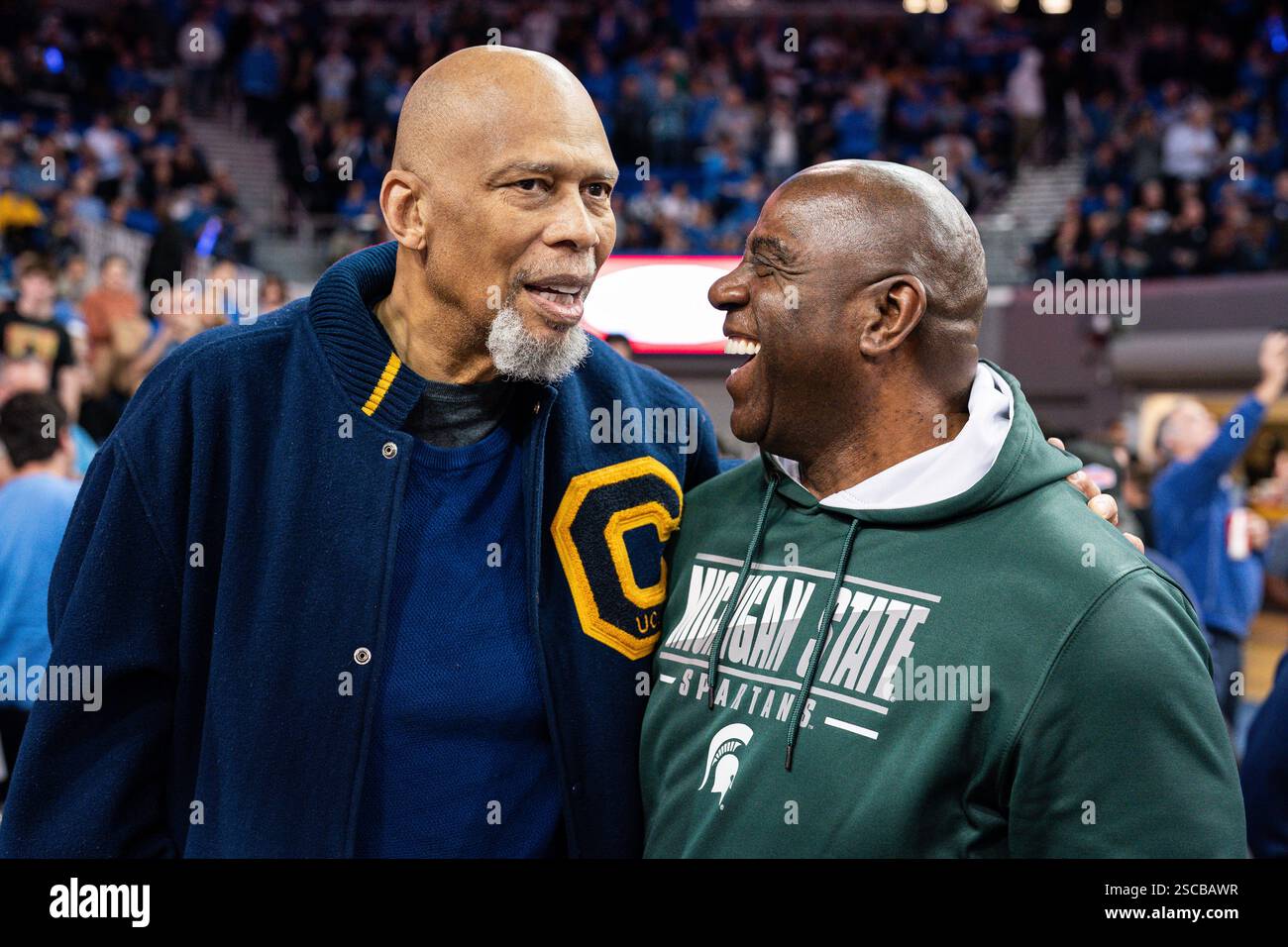 NBA legend Kareem Abdul-Jabbar (left) shares a moment with former Los ...