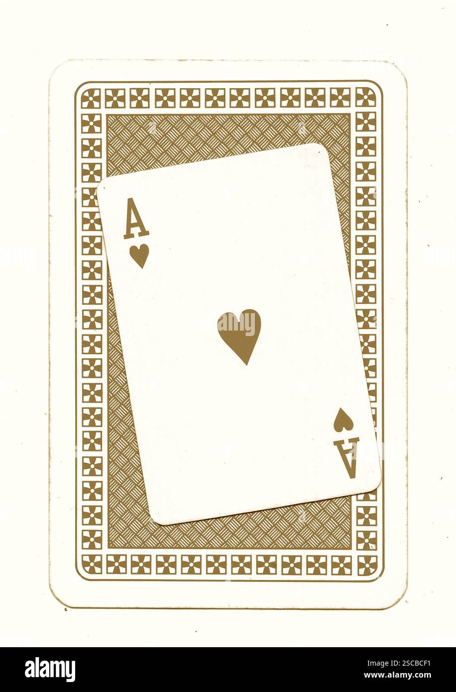 A vintage ace of hearts playing card in sepia on the reverse of another ...