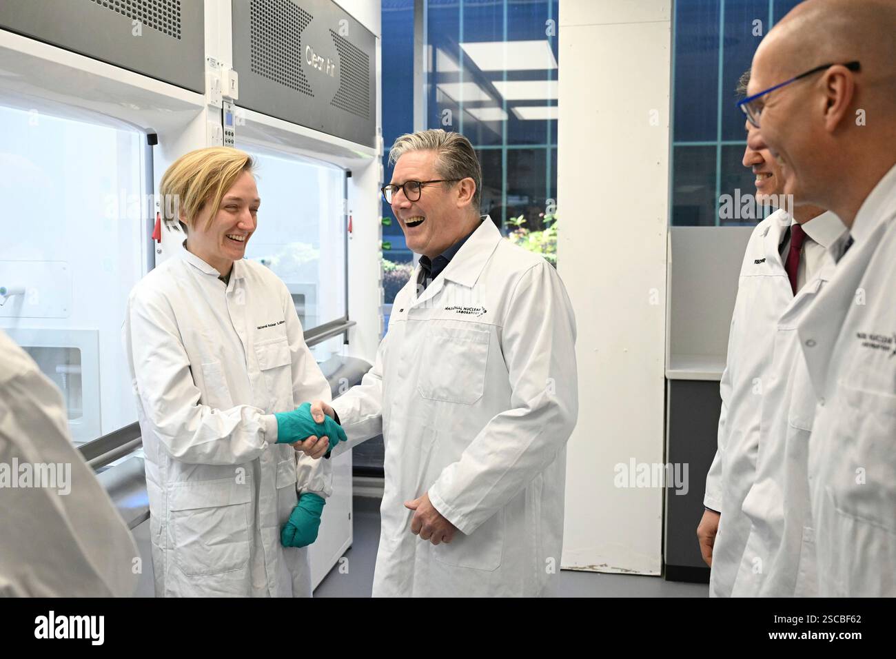 Britain's Prime Minister Keir Starmer, center, visits Springfields ...