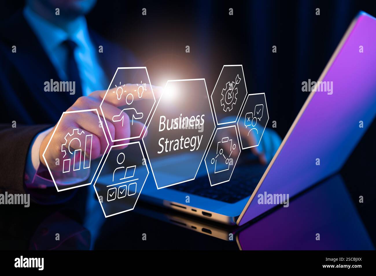 Businessman analyzing digital strategy with futuristic interface ...