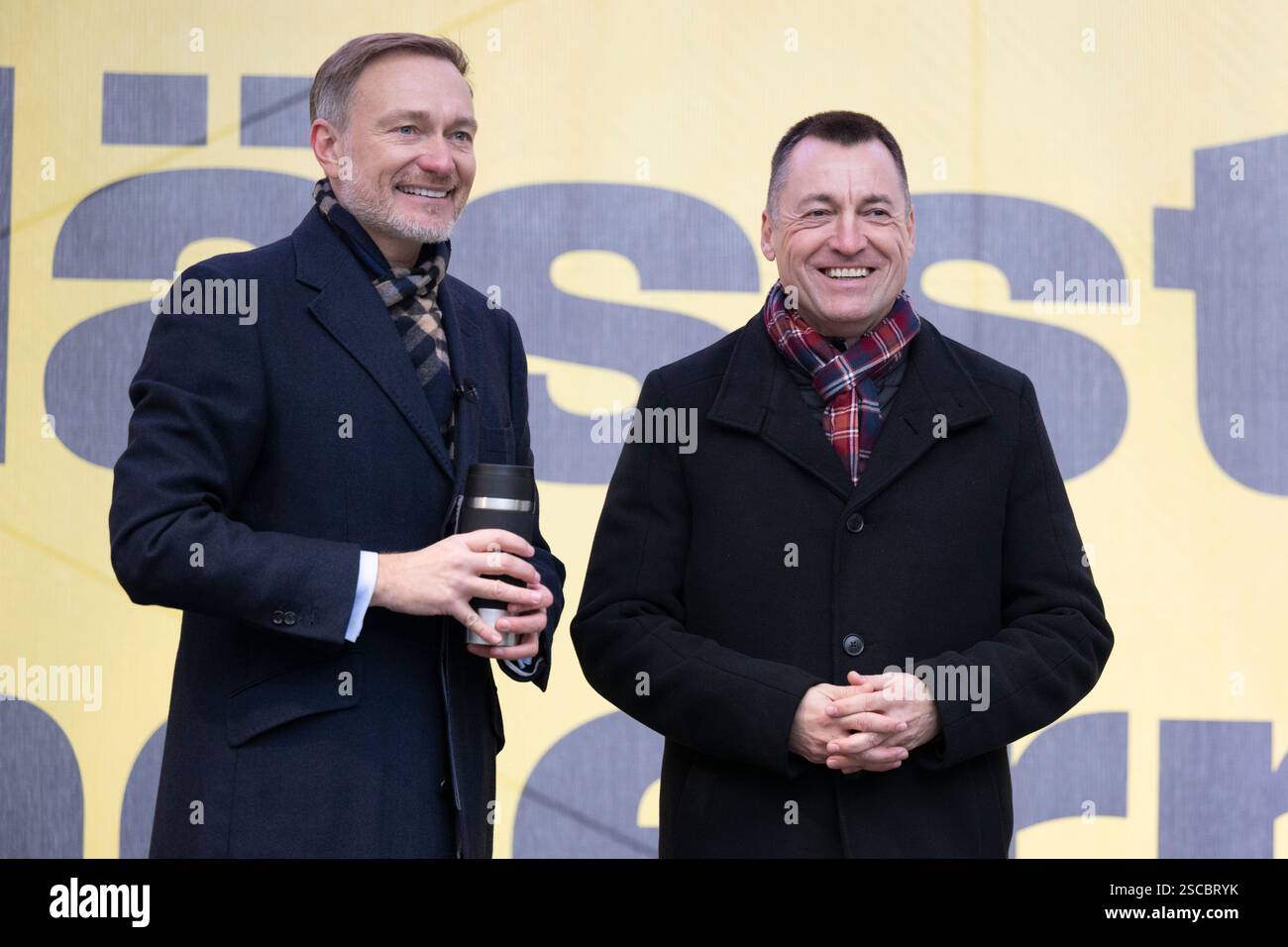 06 February 2025, Saxony, Dresden: Christian Lindner (l), FDP Chairman ...