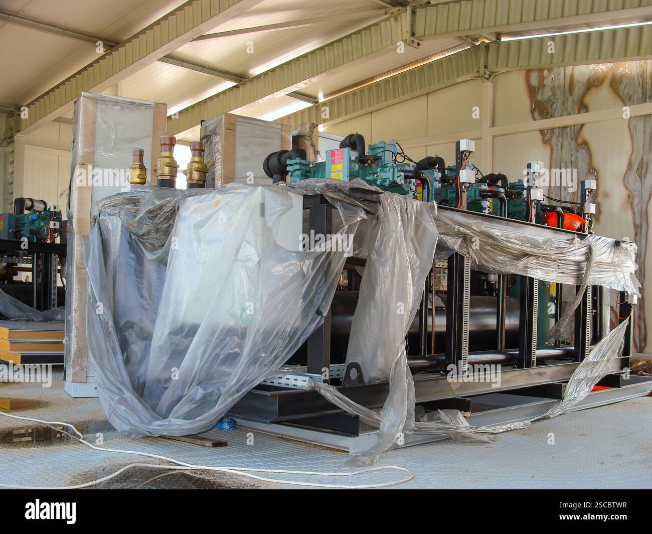 Industrial HVAC equipment setup for cold storage facility in progress ...