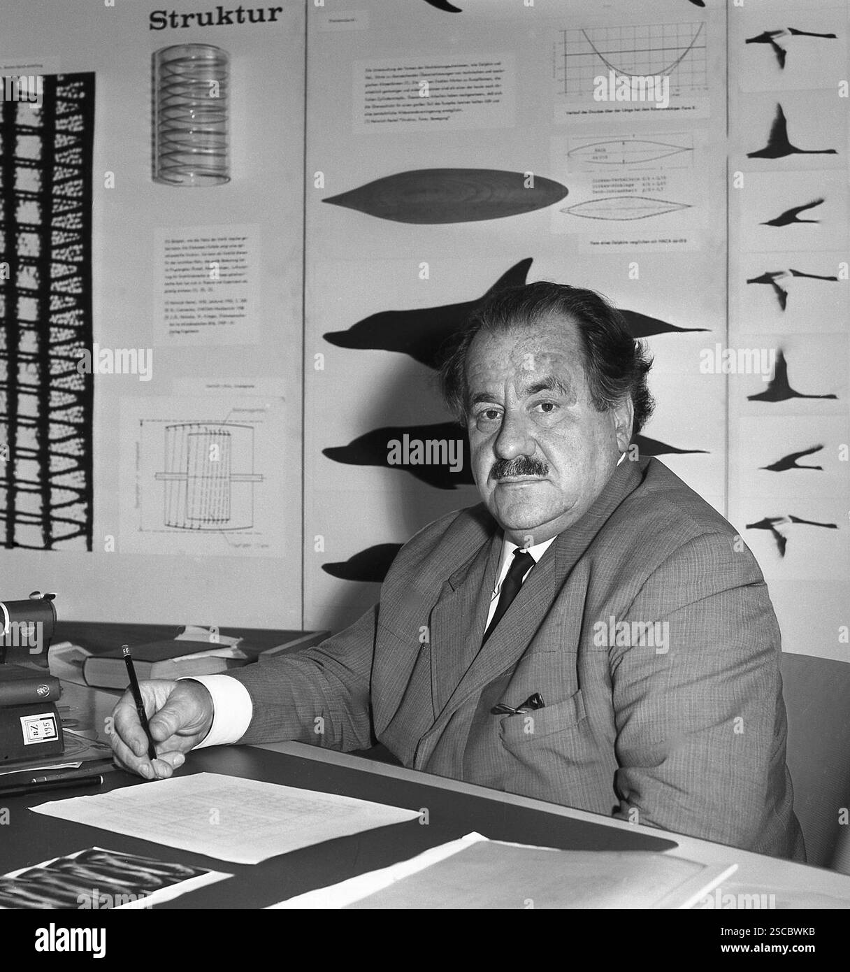 Professor at a desk and studies for a fuselage-design inspired by ...