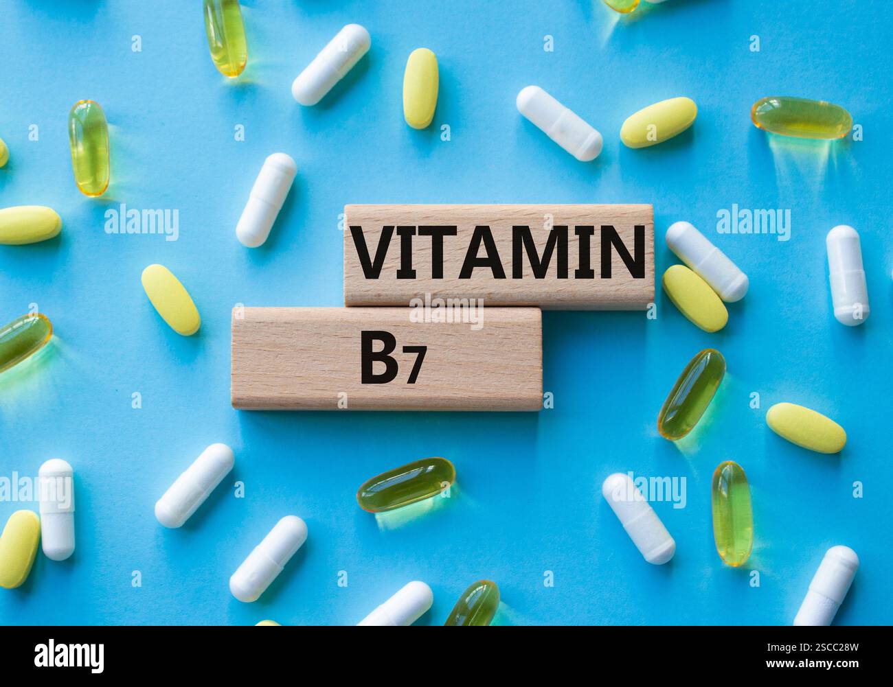 Vitamin B7 symbol. Concept word Vitamin B7 on wooden blocks. Beautiful ...