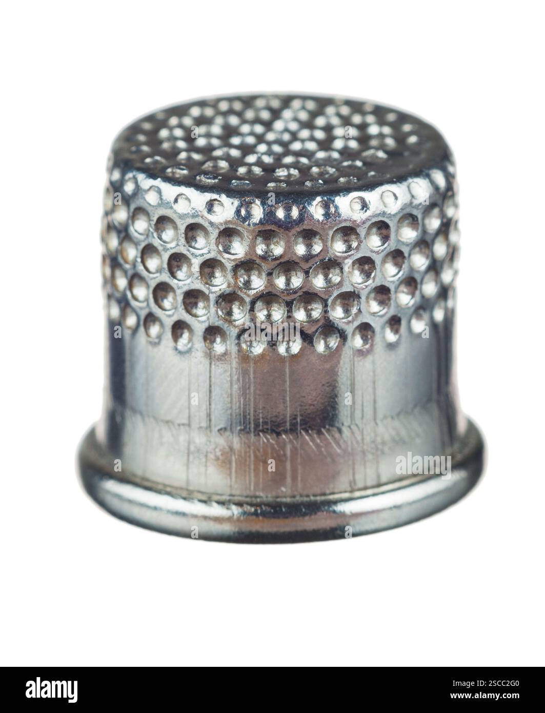 silver thimble for sewing isolated on white background Stock Photo - Alamy