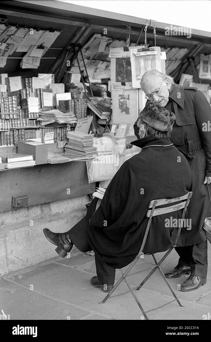 A stand of Les Bouquinistes at the Seine in Paris. These are ...