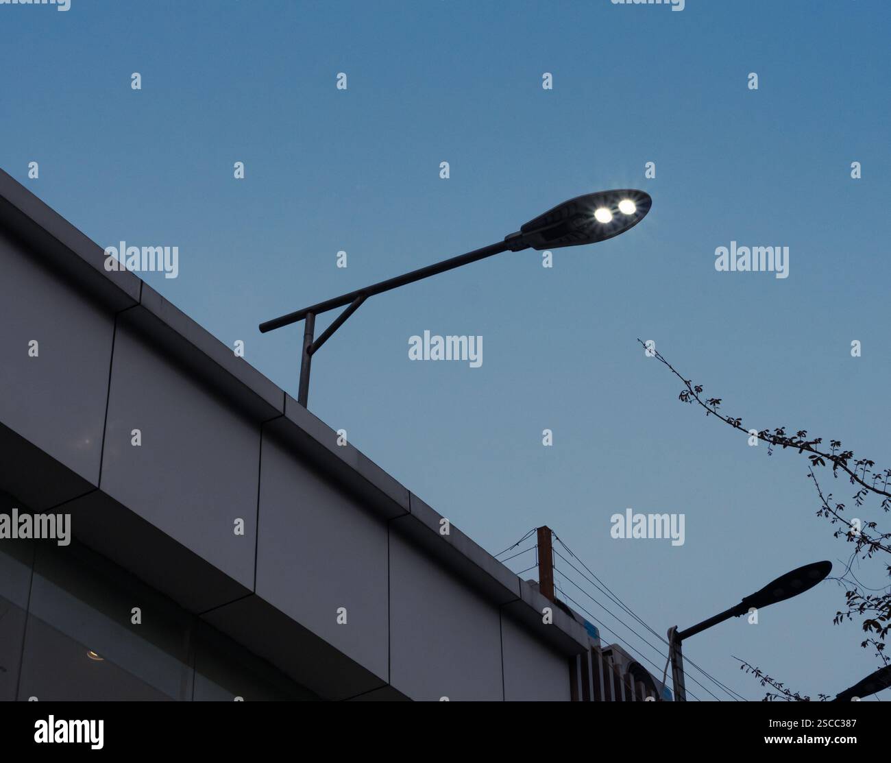 Street light against sunset background Stock Photo - Alamy