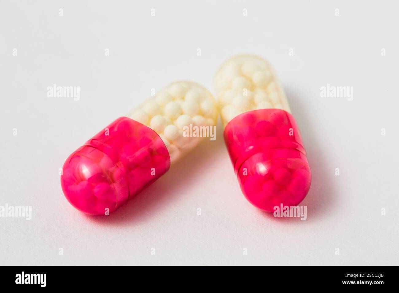 the color pill or just salmon oil capsules Stock Photo - Alamy