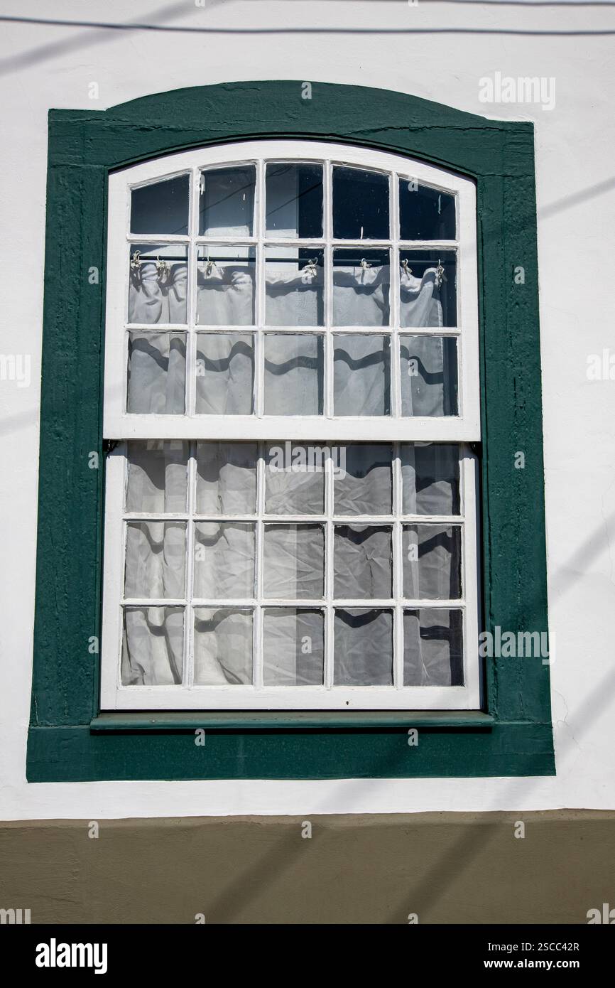 window on facade of house in Santana do Parnaiba, historic city of ...