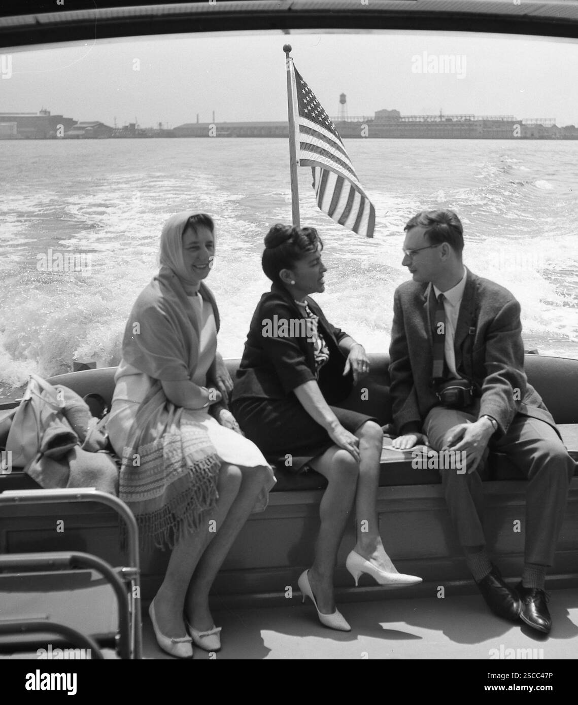 Two man in boat Black and White Stock Photos & Images - Alamy