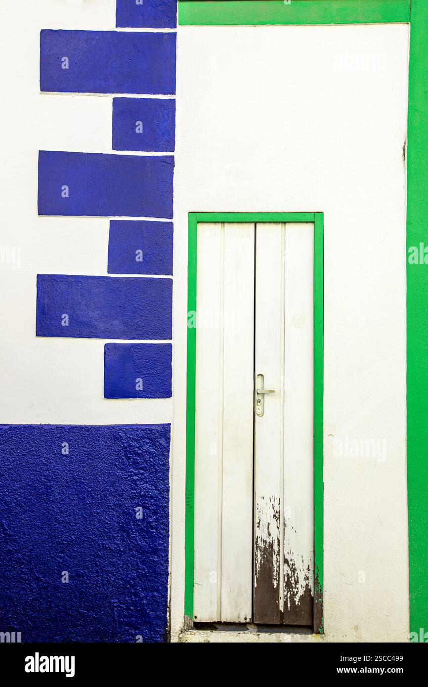 little door on facade of colonial house in Santana do Parnaiba ...
