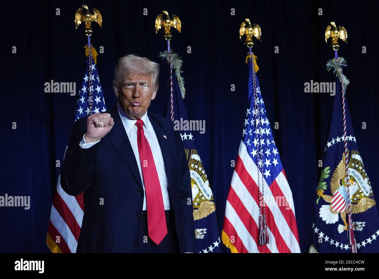 President Donald Trump attends the National Prayer Breakfast at ...
