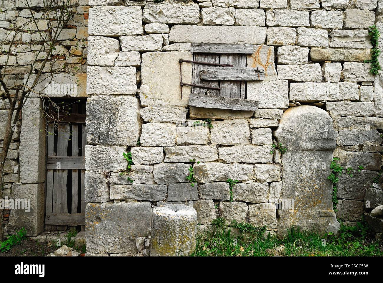 Saepinum, a funeral cippus (grave-stone) included in the wall of a ...