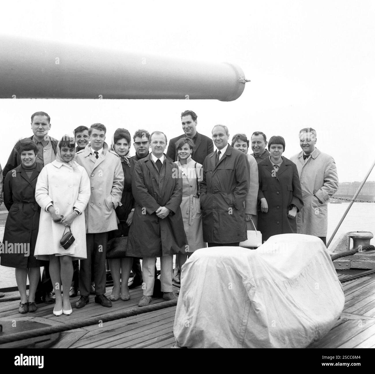 Group picture under the gun barrel of the museum ship Aurora in St ...