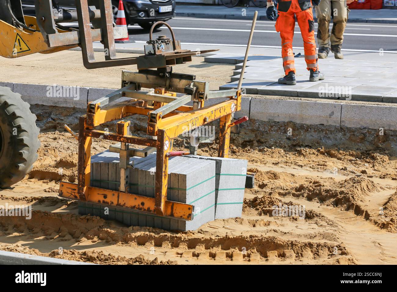 Construction worker laying paving hi-res stock photography and images ...