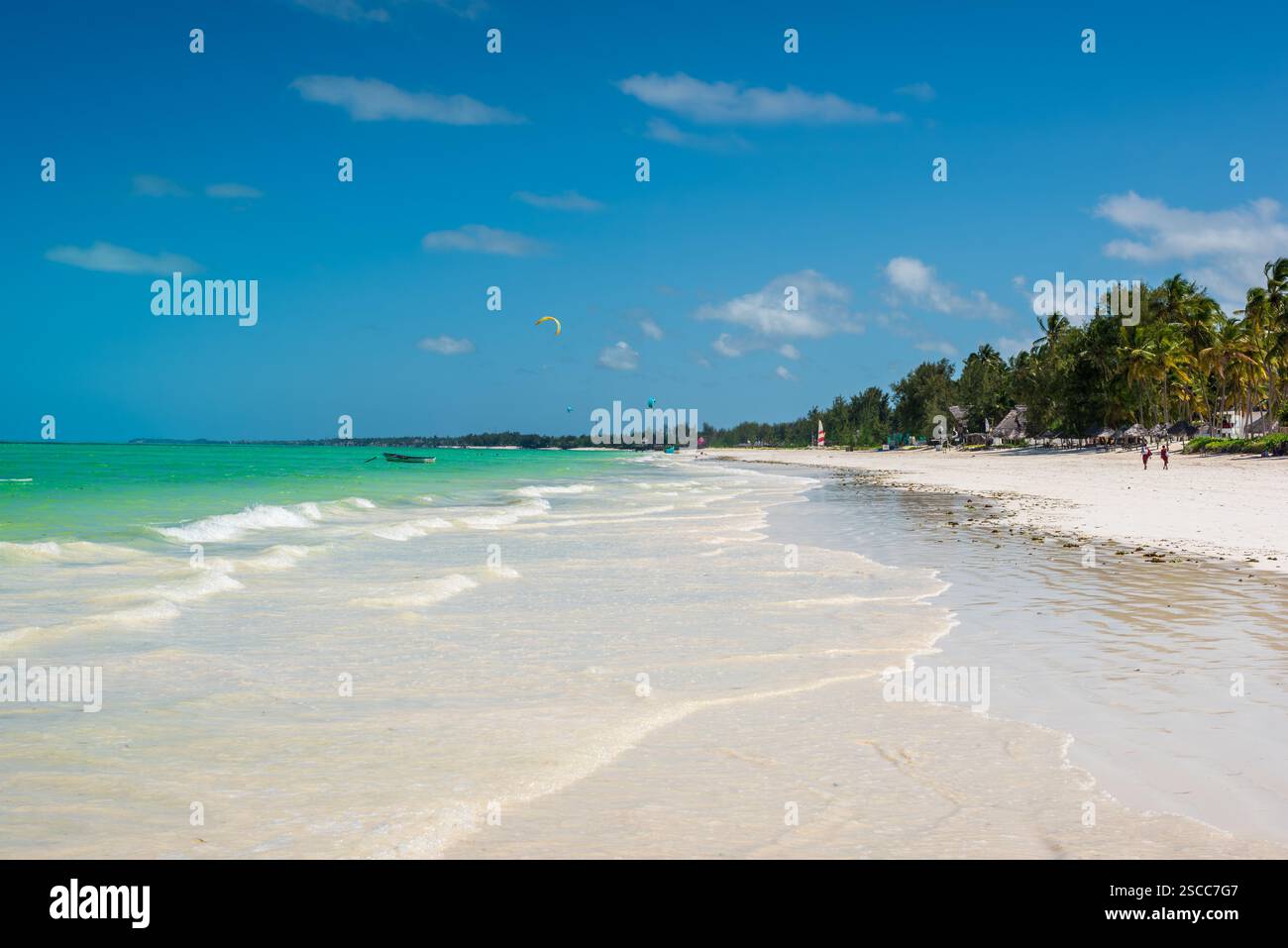 Tropical beach under the sun, Zanzibar, Tanzania Stock Photo - Alamy