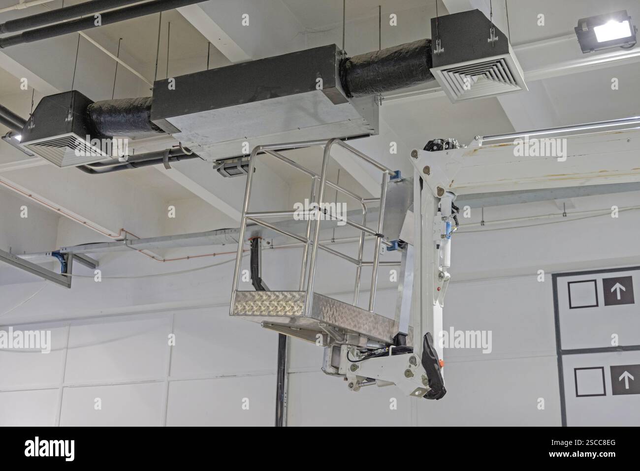 Aerial Platform Basket Crane in Hall Air Duct Hvac Works Stock Photo ...
