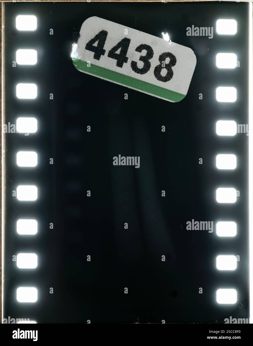 A vintage film negative, showing the beginning of the roll with a label ...