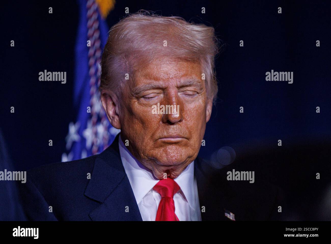 President Donald Trump participates in a prayer at the National Prayer ...
